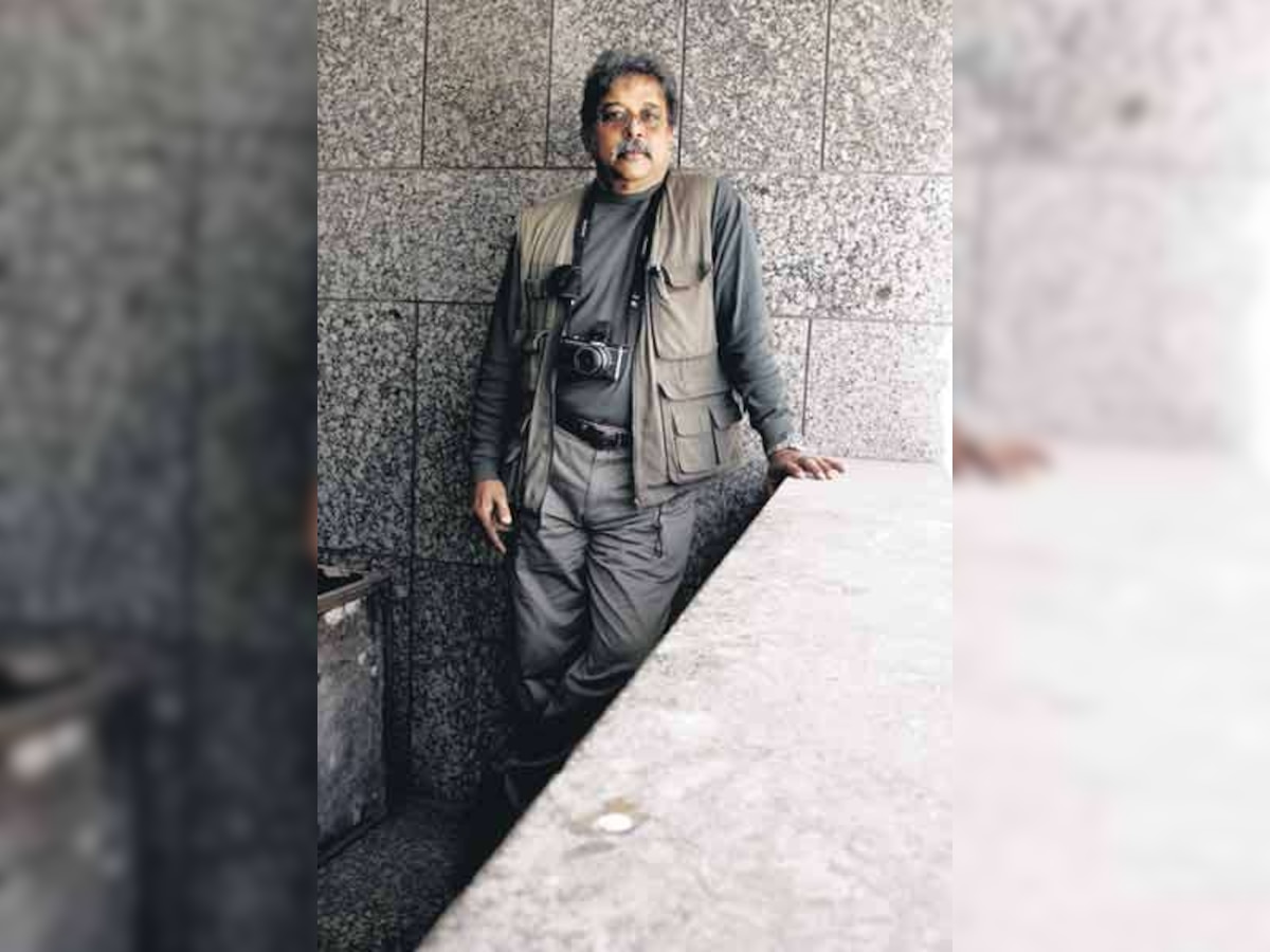 Photographer John Isaac clicks with a heart