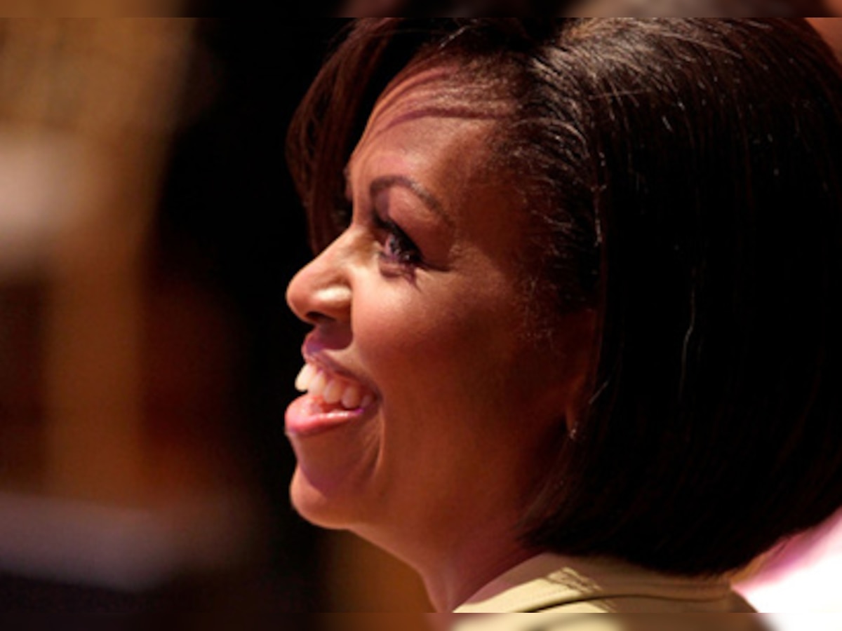 Michelle Obama branded a 'hypocrite' for eating ribs on ski vacation