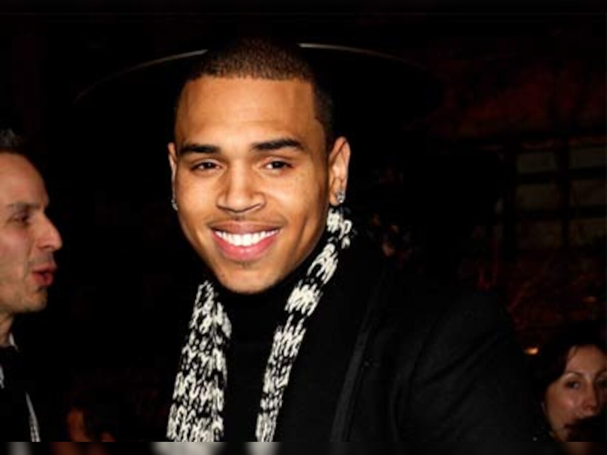 Chris Brown hints he will sue R&B singer Raz B