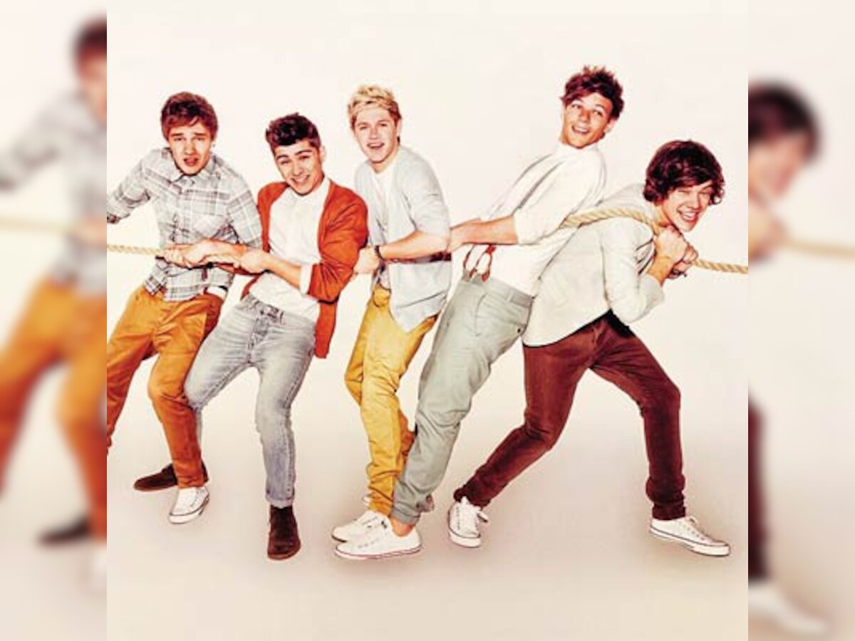 I'm the sixth member of One Direction: Robbie Williams