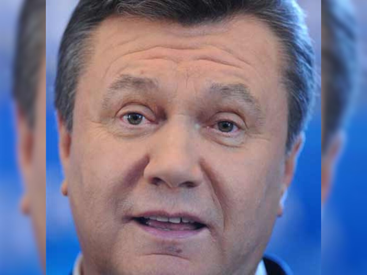 Ukrainian President Viktor Yanukovich agrees truce with opponents as ...