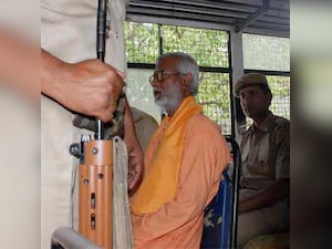 Who is Swami Aseemanand?