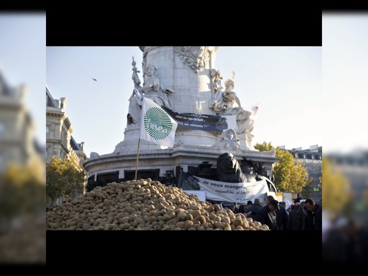 'Eat French': Farmers protest by dumping potatoes and manure at ...