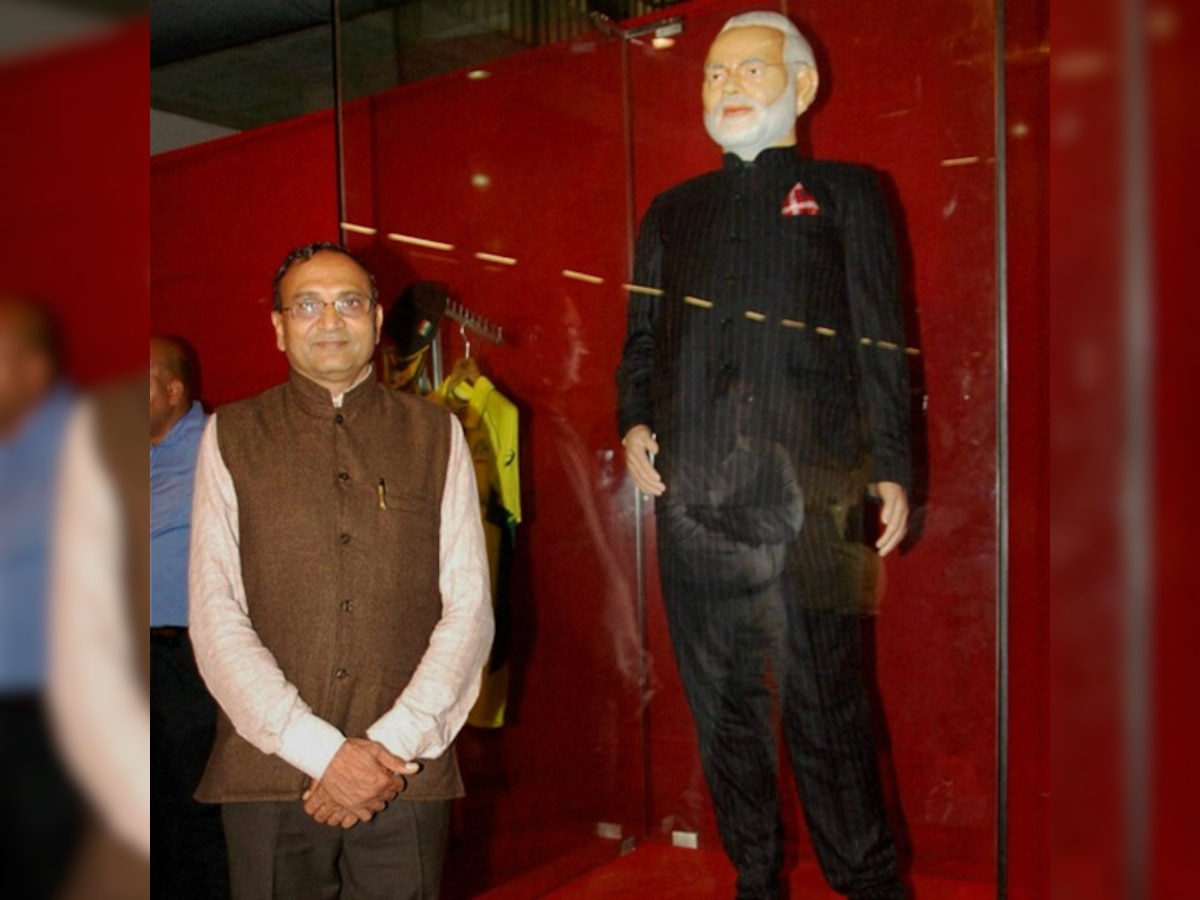 Owner of PM Modi's pinstripe suit takes it out on a procession in Surat