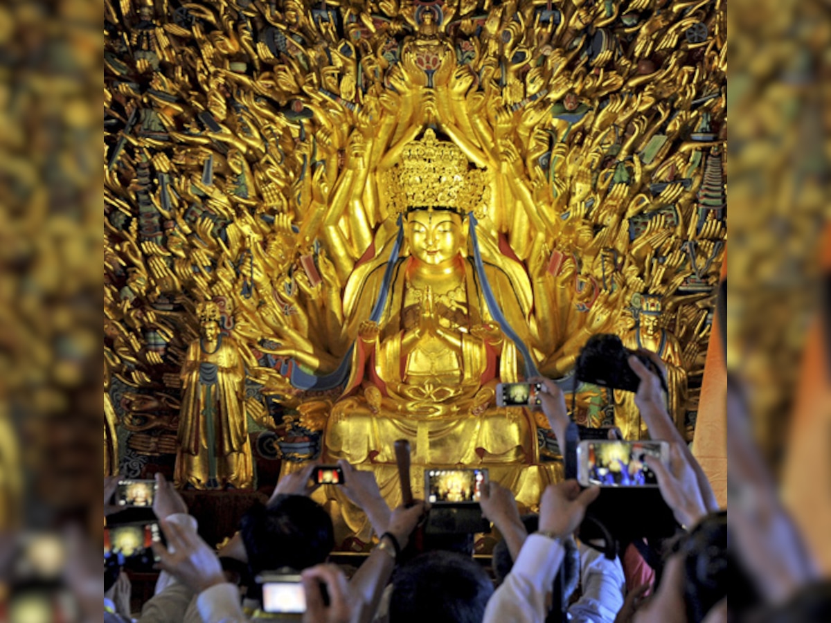 China unveils 800-year-old Buddha statue with 1,000 hands, after 7 ...