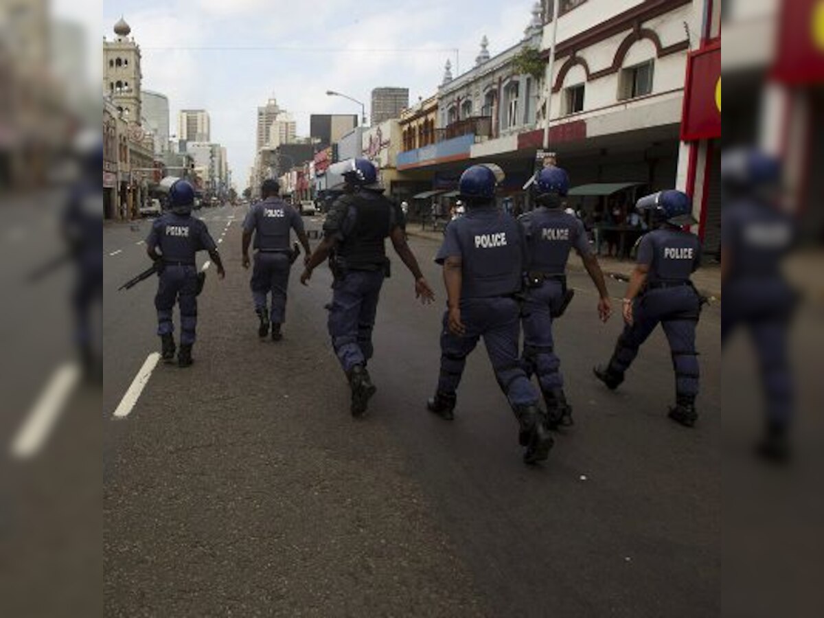 South African police fire rubber bullets at parents during school protest