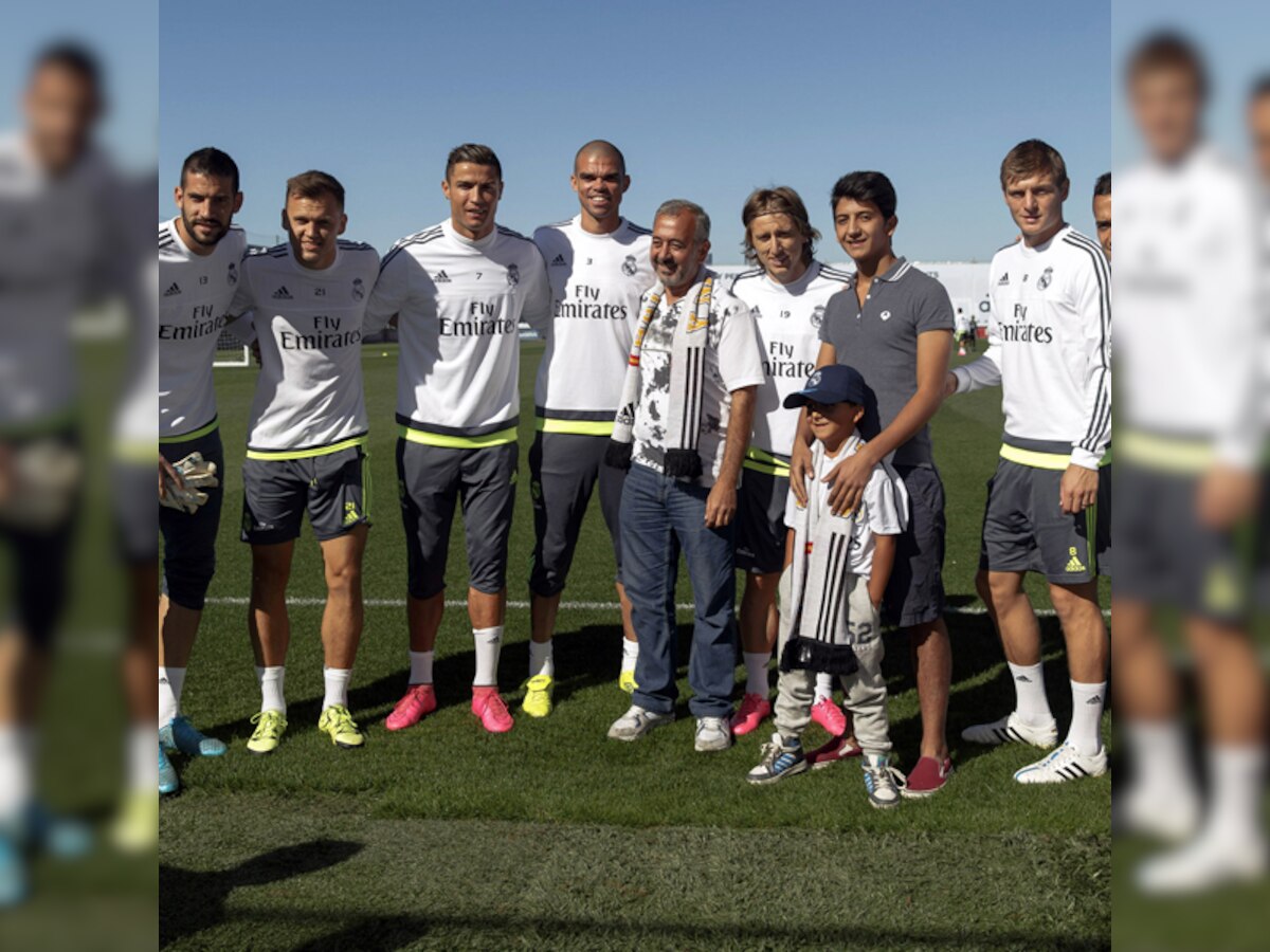 Real Madrid invite Syrian boy tripped by camerawoman to walk out on ...