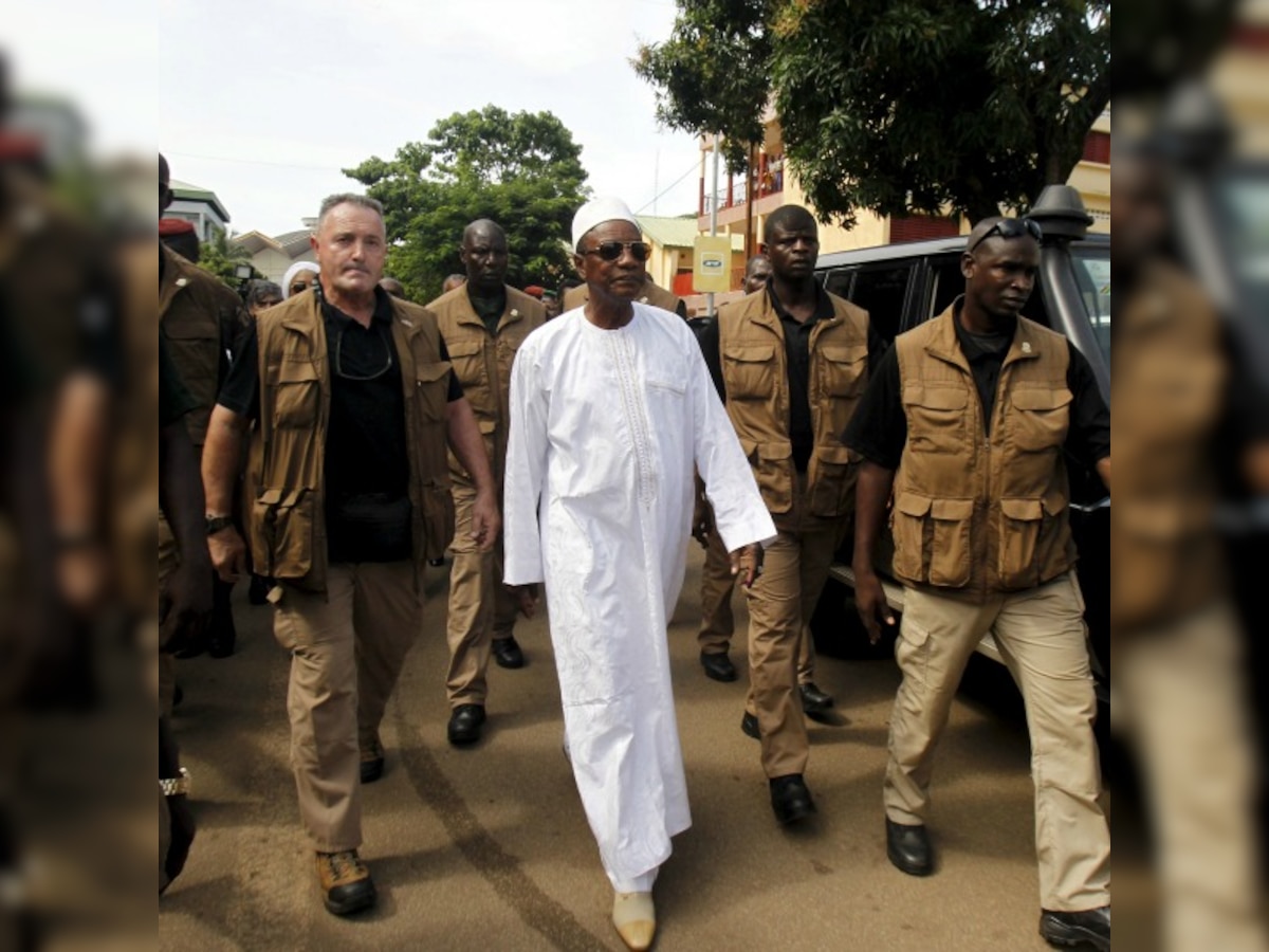 Guinea President Alpha Conde wins second term, opponent vows to protest