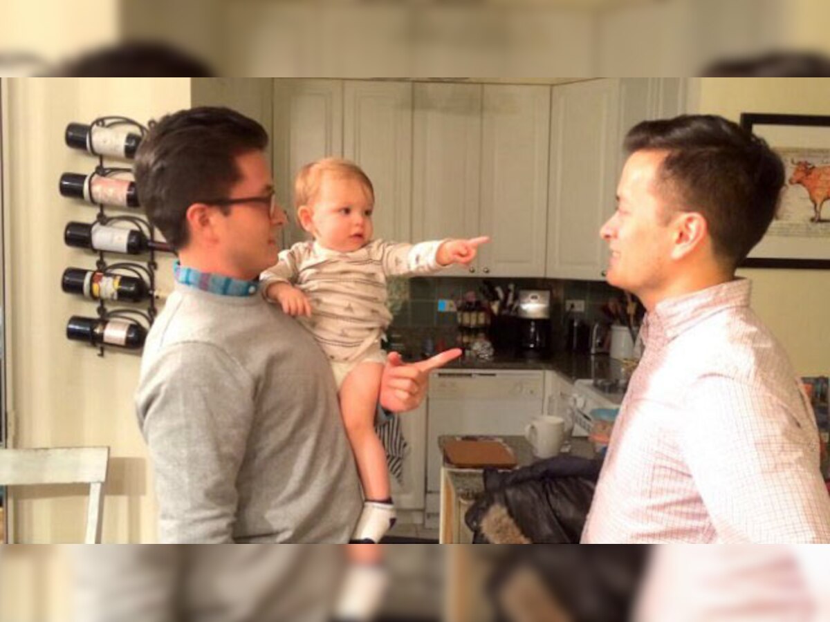 Watch: Baby meets father's identical twin; his reaction is hilarious