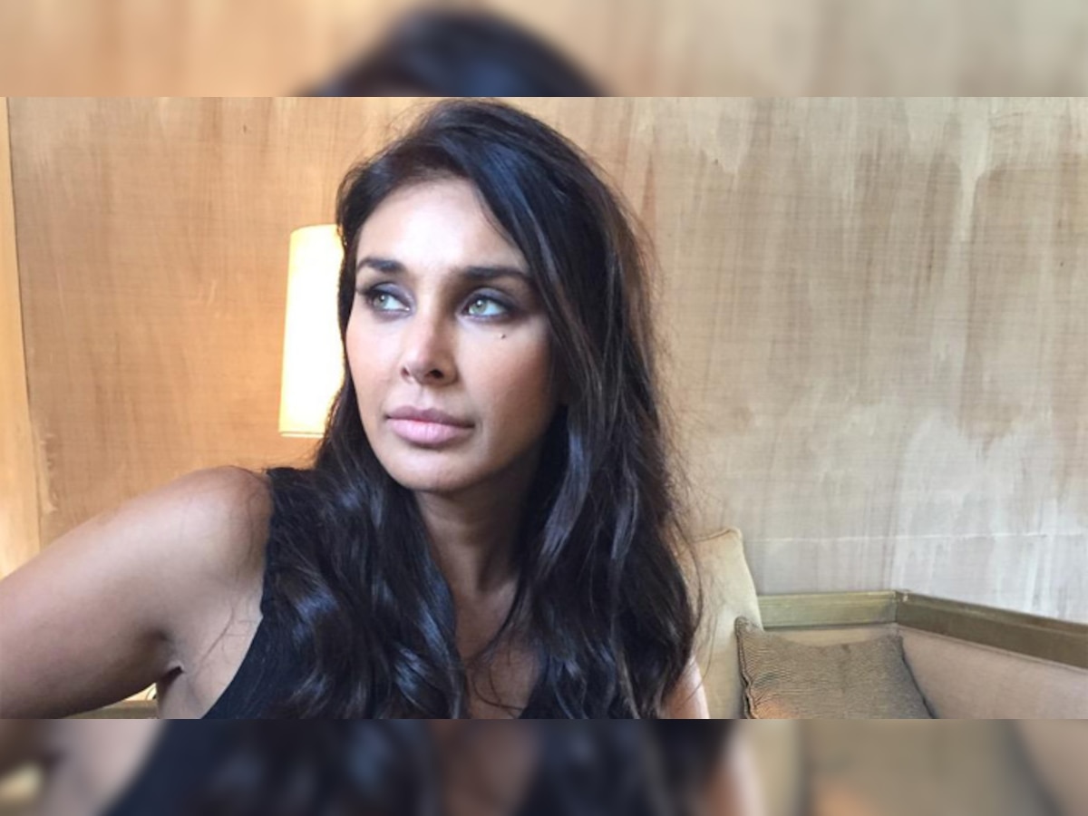 20 years of photogenic proof behind me: Lisa Ray denies lip surgery in ...
