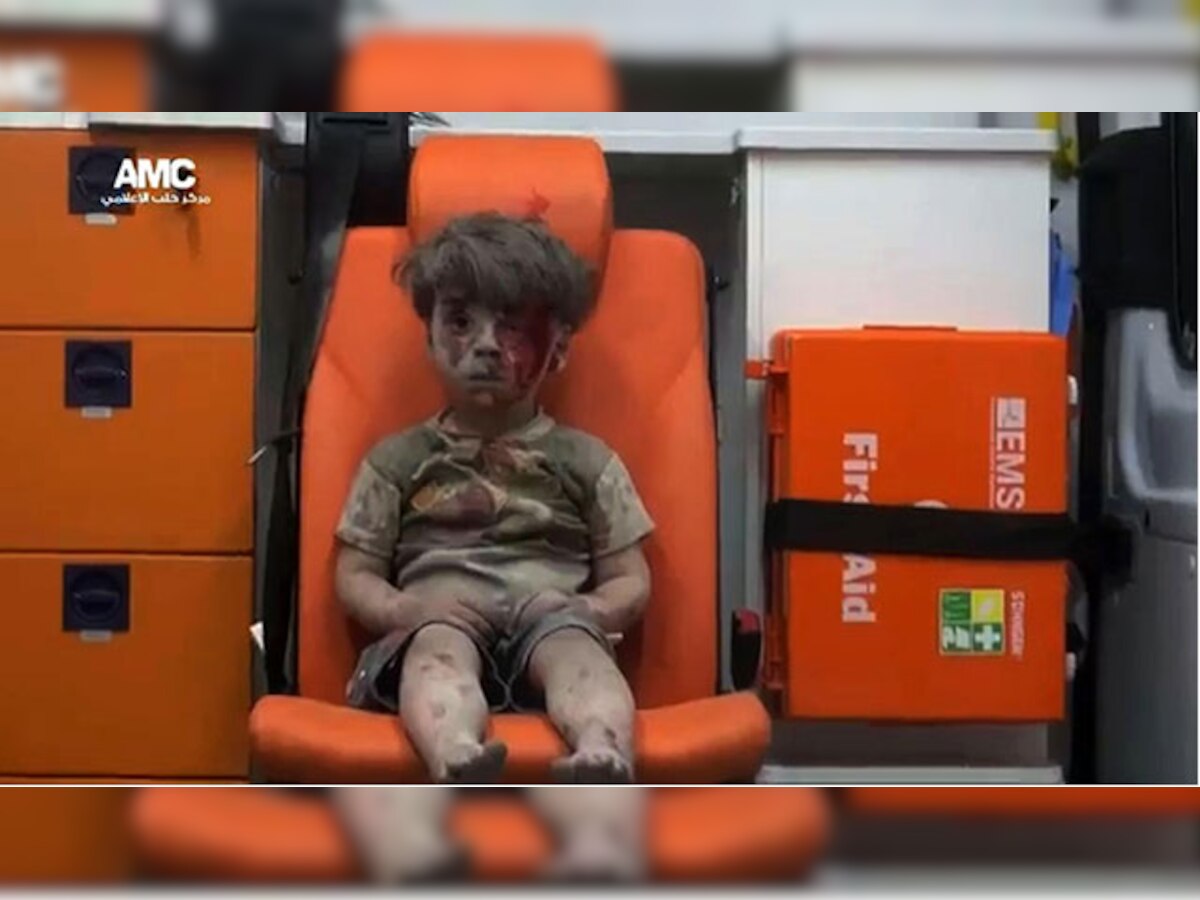 Aleppo: Covered in dust and blood, image of dazed 5-year-old boy ...