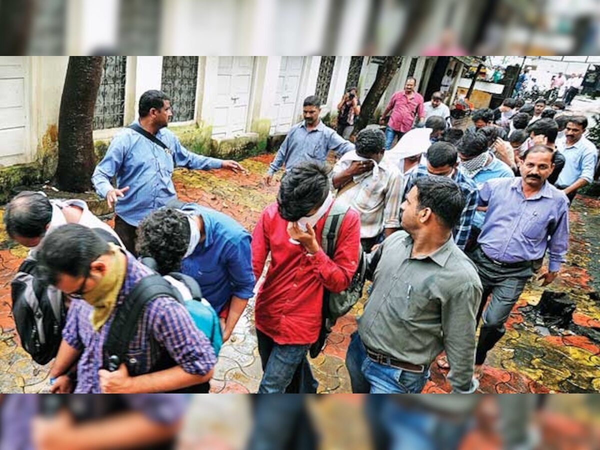 US charges 61 people in Indian call center scam