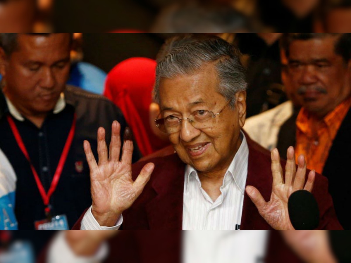 Najib Razak's brother says Malaysia needs change