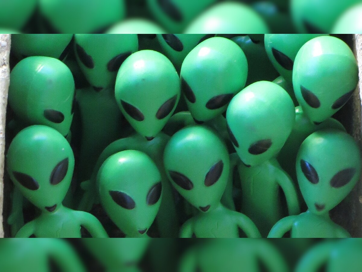 Aliens exist but may be in a parallel universe