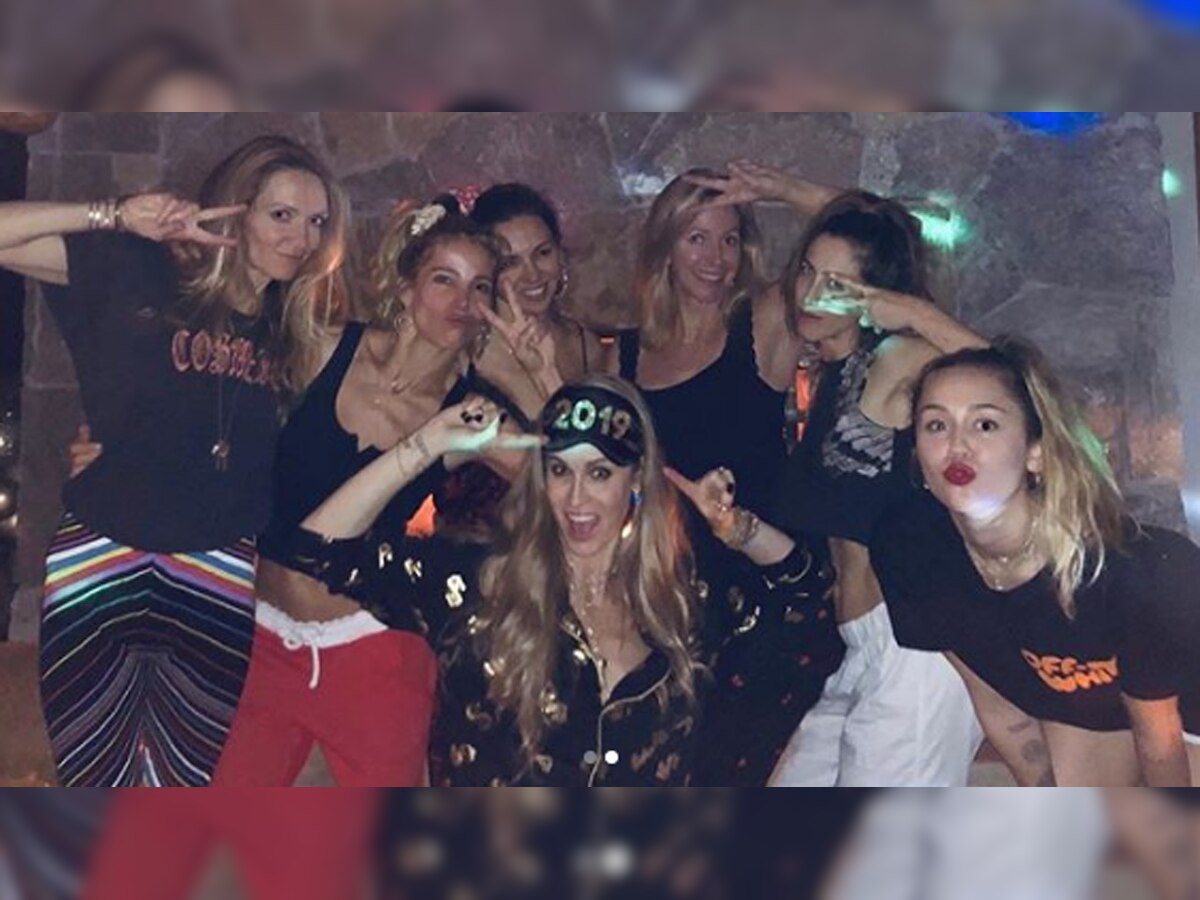 Here's a sneak peek into Miley Cyrus' NYE celebration with the Hemsworths