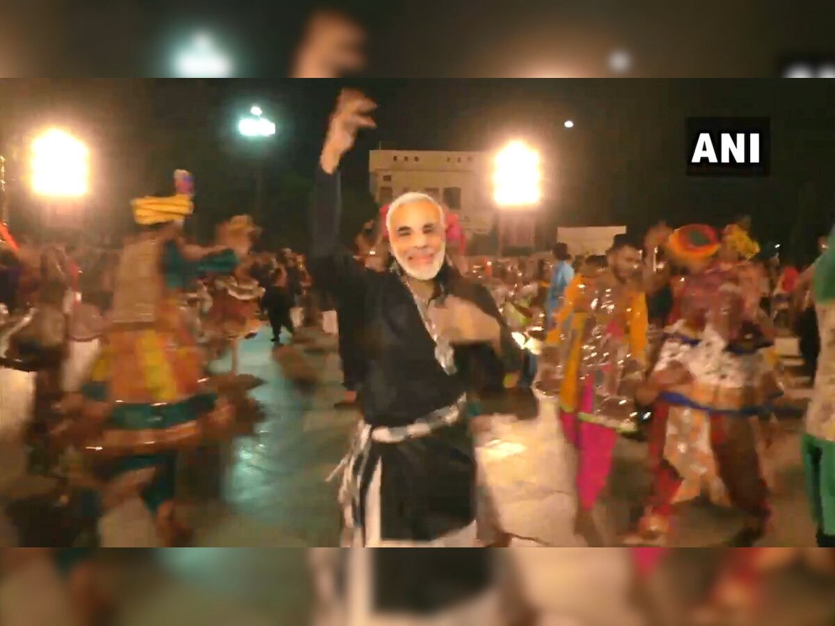 Watch: People wear Modi masks while performing 'Garba' in Surat
