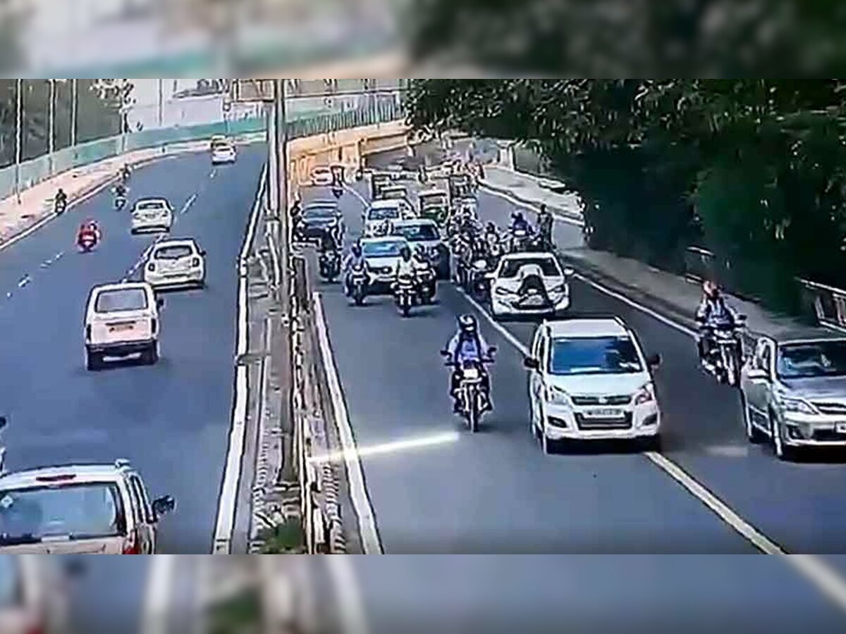 Viral video: Delhi traffic cop dragged on car bonnet as violater tries ...