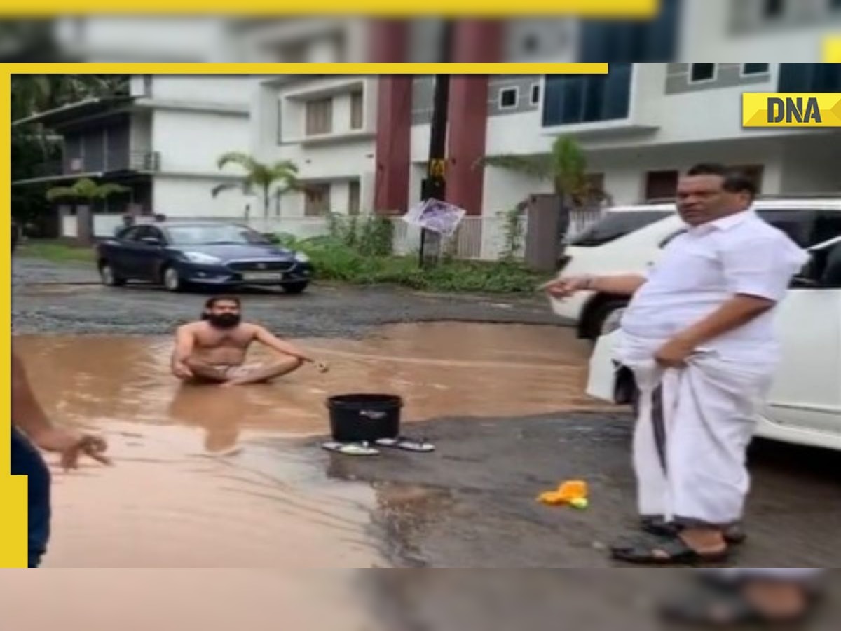 WATCH: Unique 'Pothole Protest' goes viral, Kerala man does yoga, takes ...