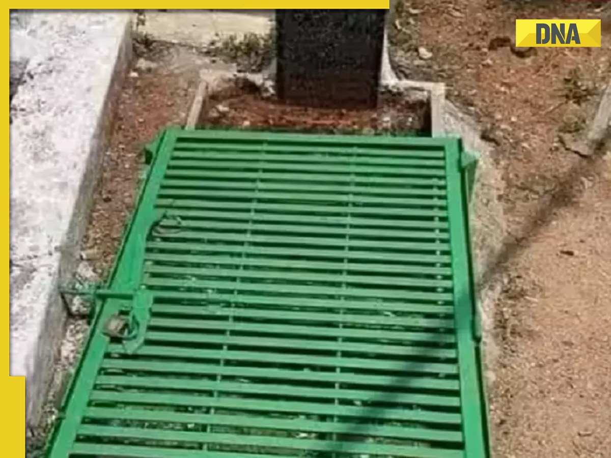 DNA Verified: Viral photo of Pakistan grave with padlock, iron bars ...