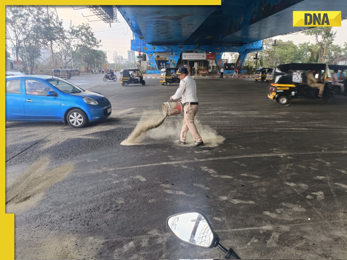 ‘Hero in uniform’ : Pic of Mumbai cop sprinkling sand on slippery road ...