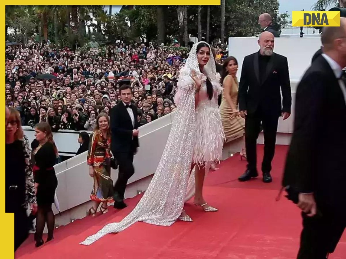 Cannes 2023: Sapna Choudhary sparkles in feather hood gown after ...