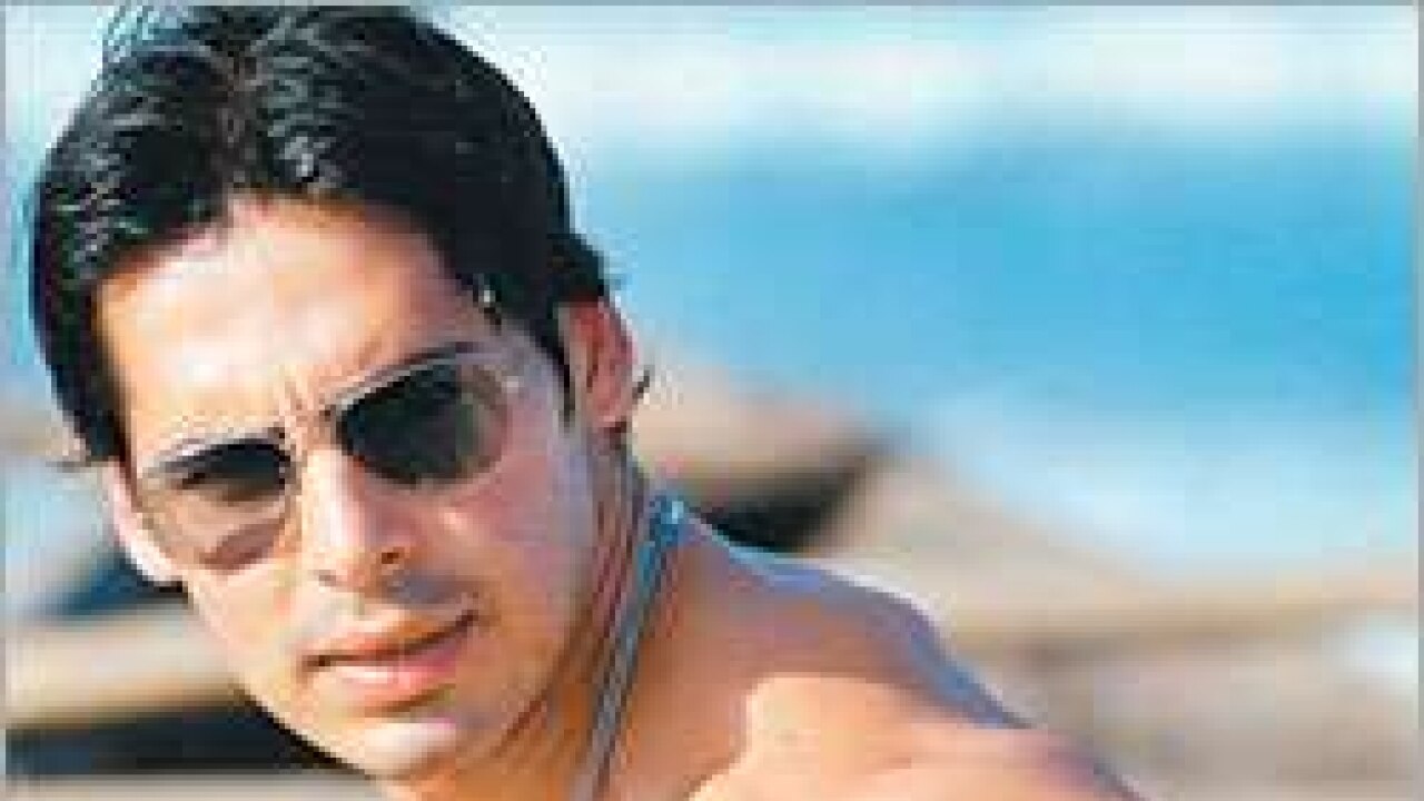 Dino plays the model judge