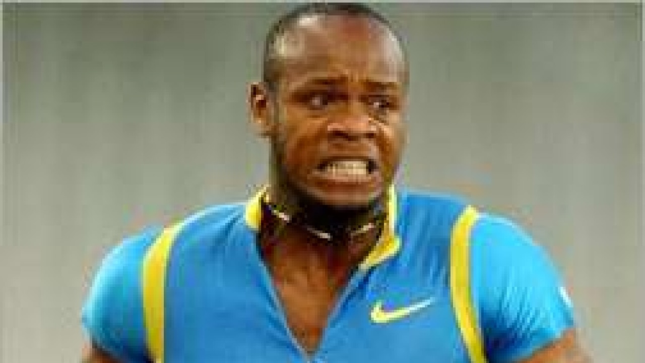 Asafa Powell equals world record