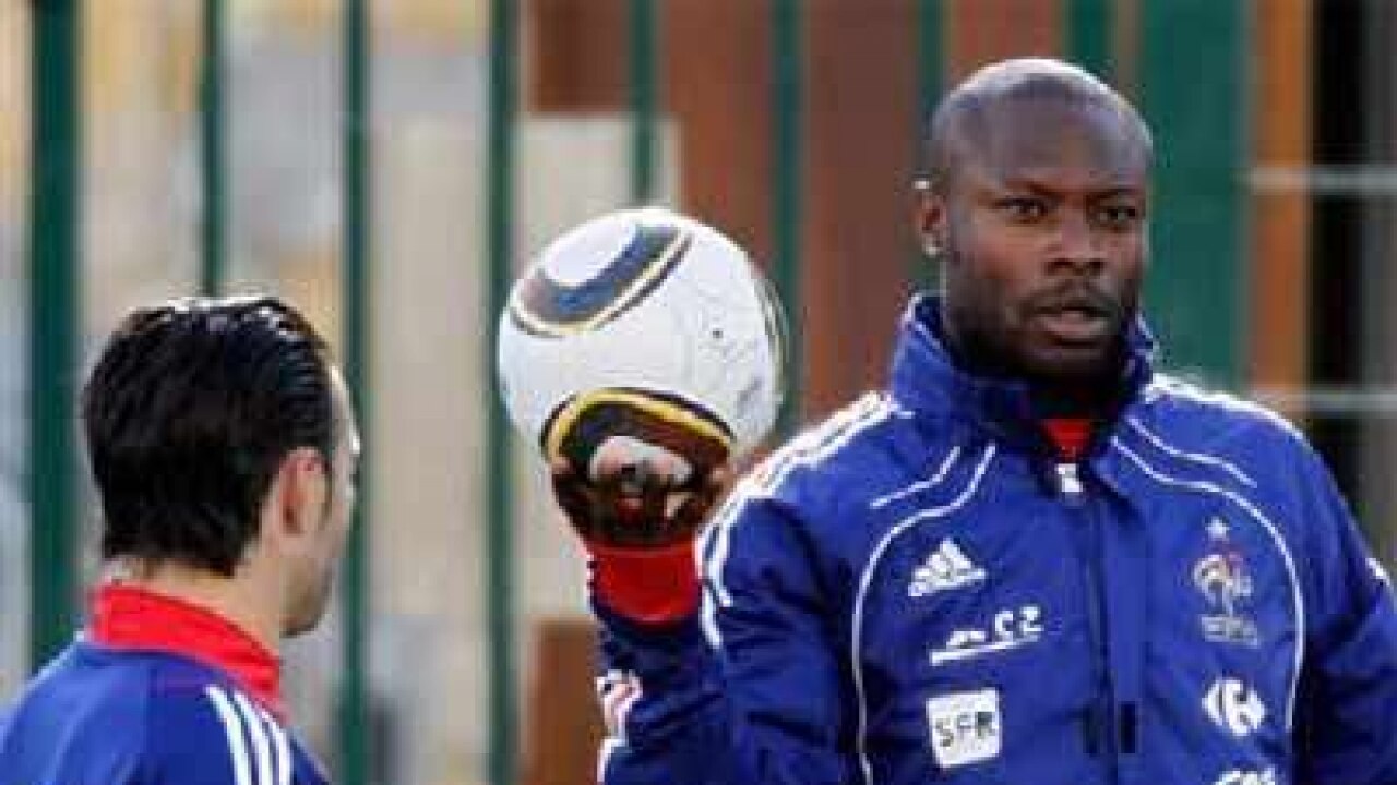 France's Raymond Domenech prepares for musical chairs