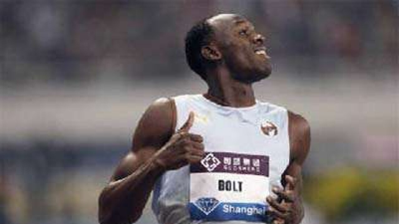 Usain Bolt cruises to victory on China return
