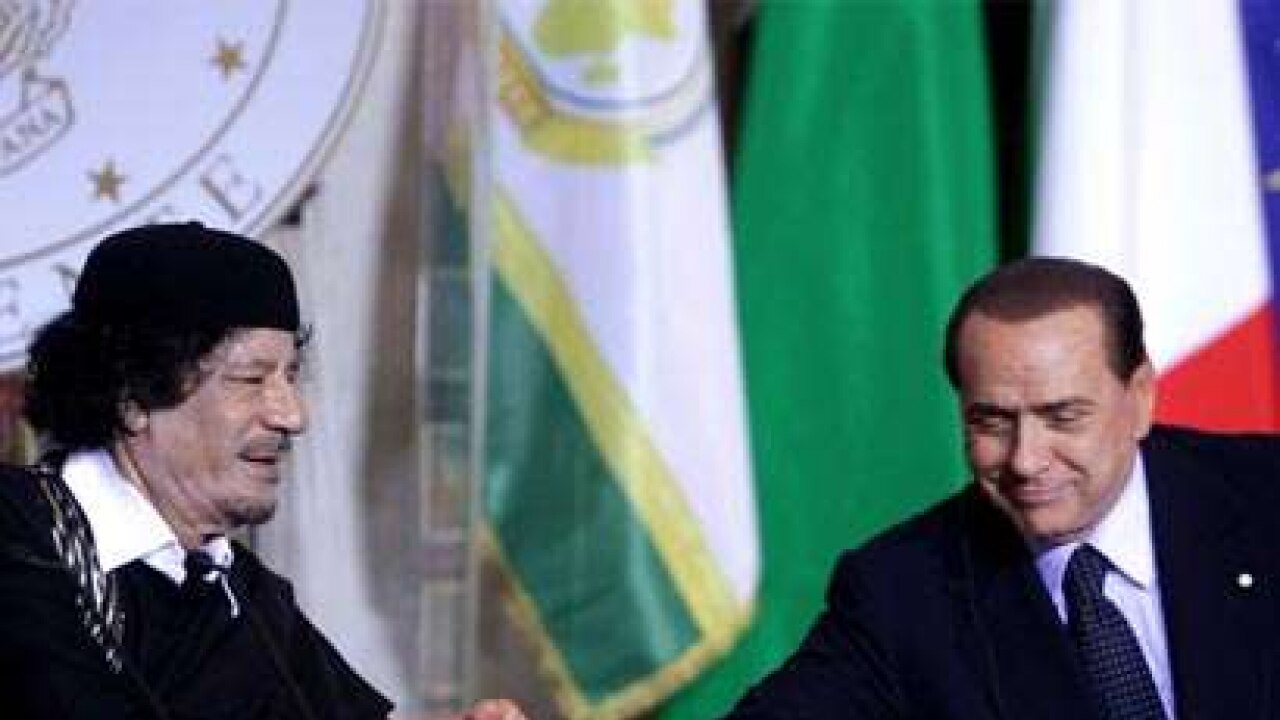 Libya's Muammar Gaddafi causes upset on Italy visit
