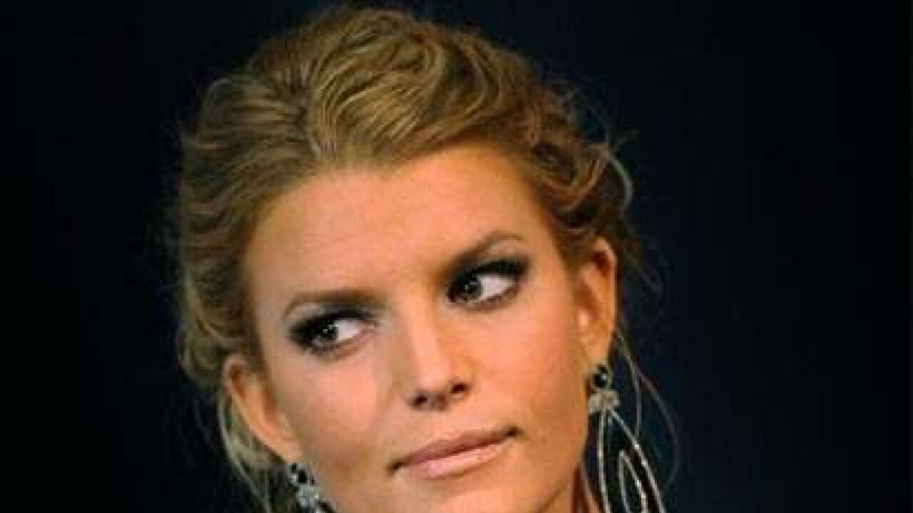 Jessica Simpson throws up while visiting sailors