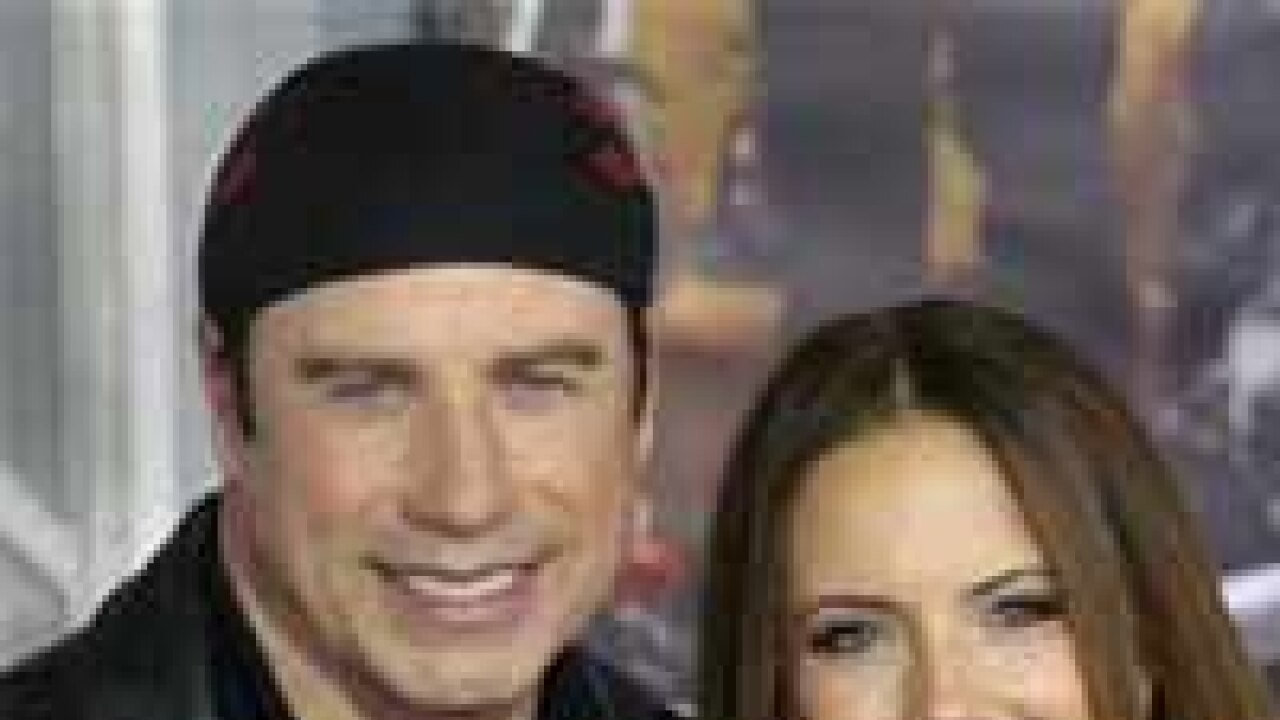 John Travolta and Kelly Preston show off their newborn baby boy