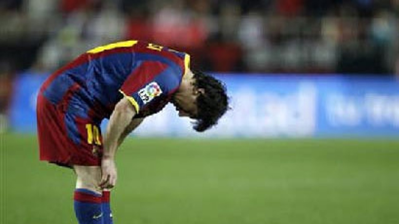 Lionel Messi nursing bruised knee after draw in Sevilla