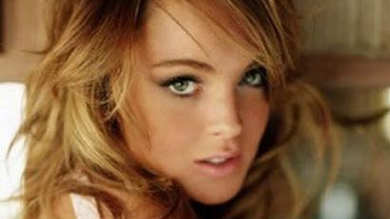 Lindsay Lohan using 'e-cigarette' to curb nicotine addiction