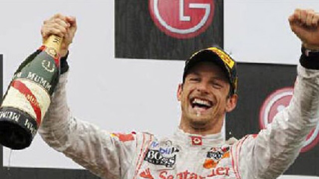 Jenson Button wins rain-delayed Canadian GP thriller