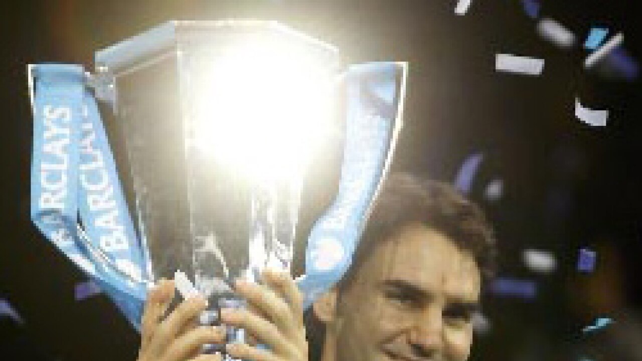 Roger Federer tames Tsonga to end year on high