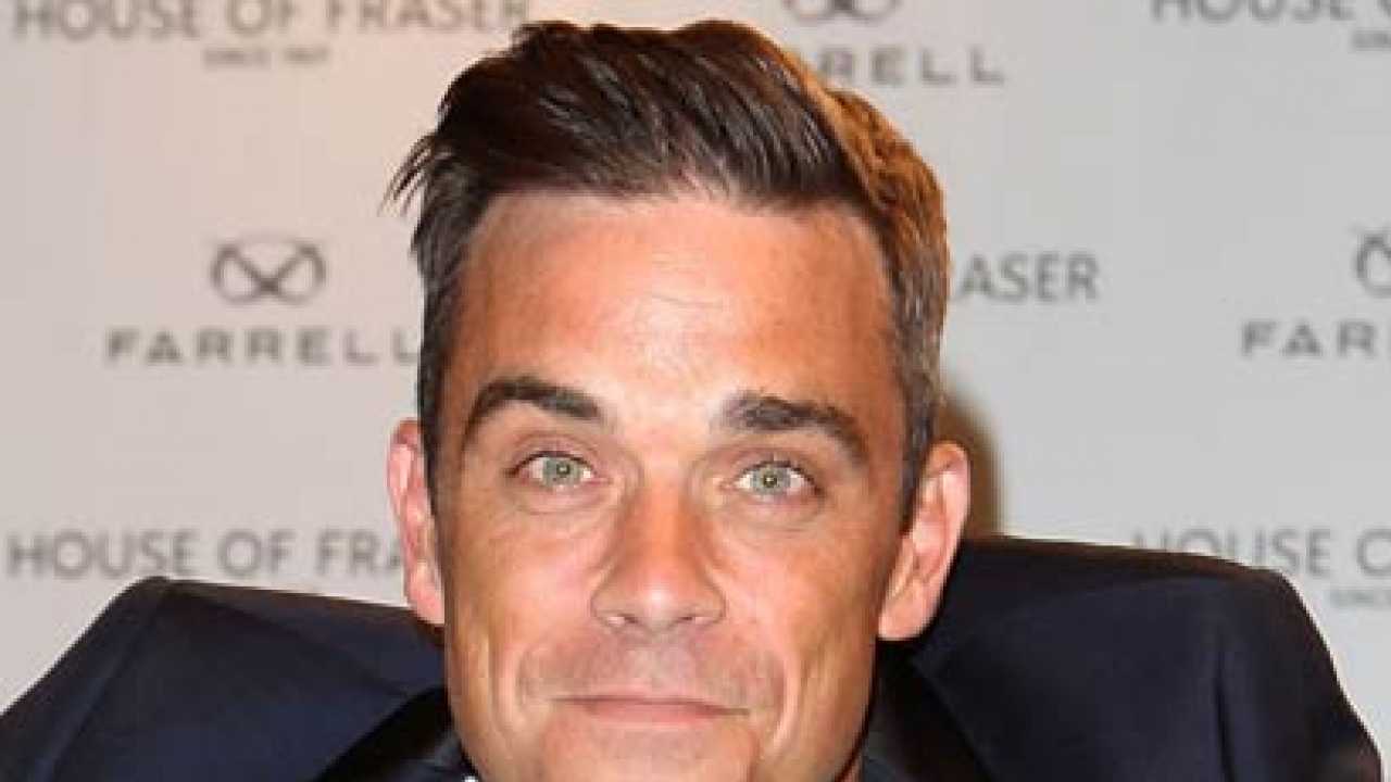 Robbie Williams turns to Victoria Beckham for baby advice