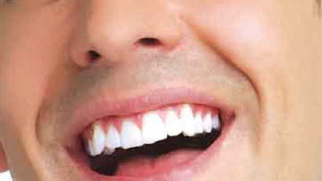 Simple smile 'may hold key to having your way with women'