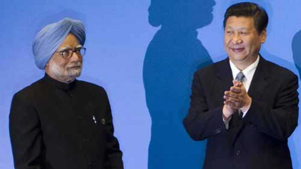 Manmohan Singh meets Chinese President; raises Brahmaputra issue