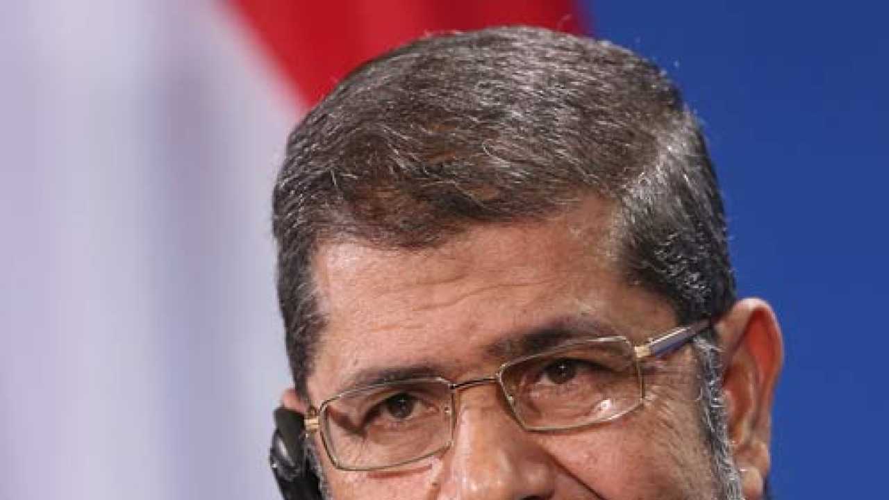 President Mohamed Mursi cuts Egypt's Syria ties, backs no-fly zone