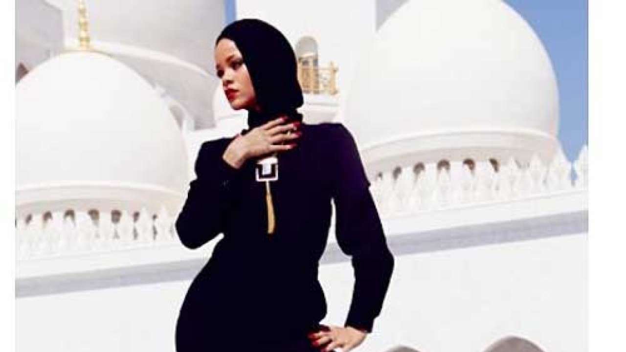 Rihanna sparks outrage by posing in hooded black jumpsuit in UAE mosque