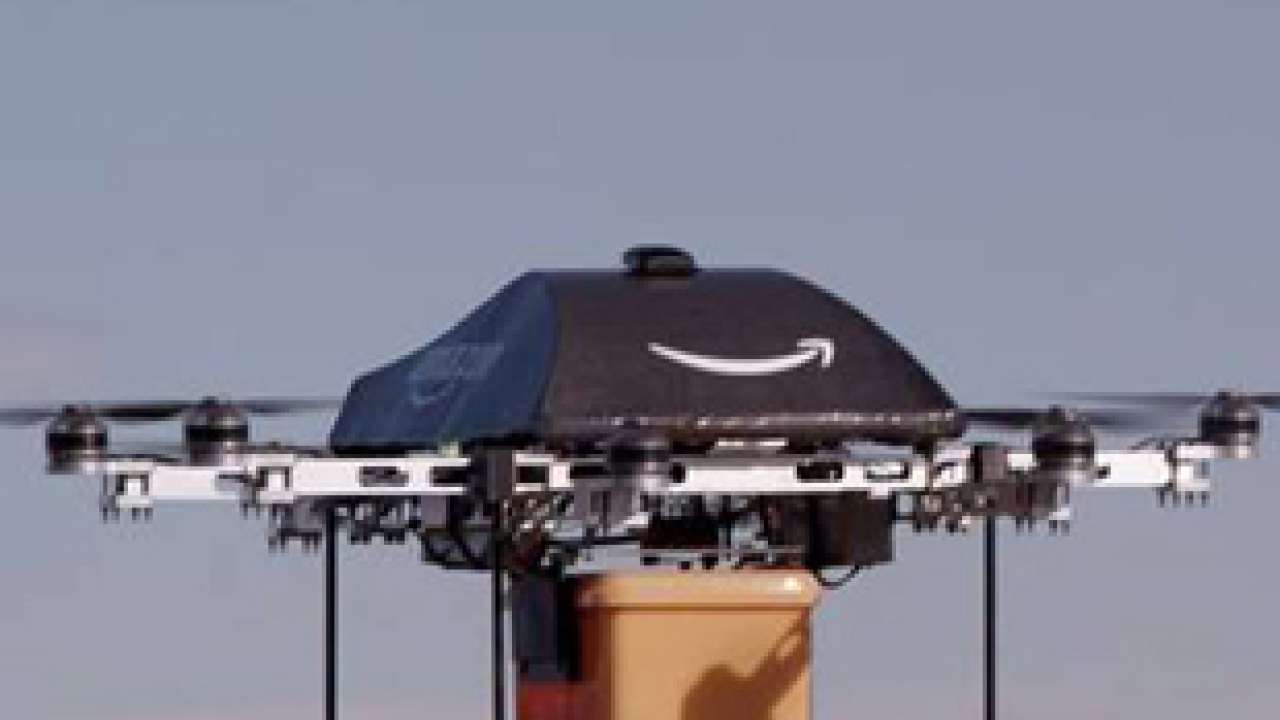 Amazon unveils futuristic mini-drones to deliver packages