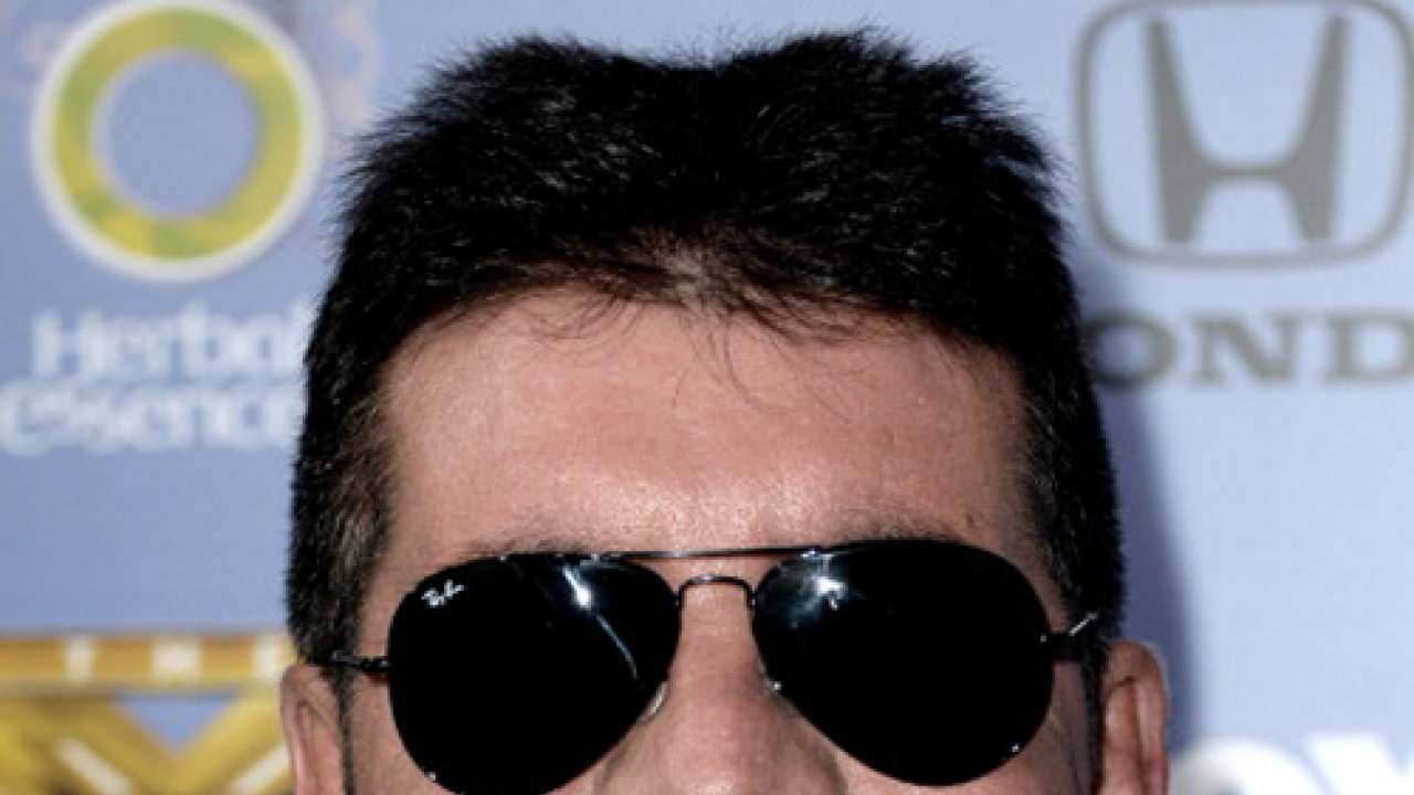 Simon Cowell calls Russell Brand a 'hypocrite'
