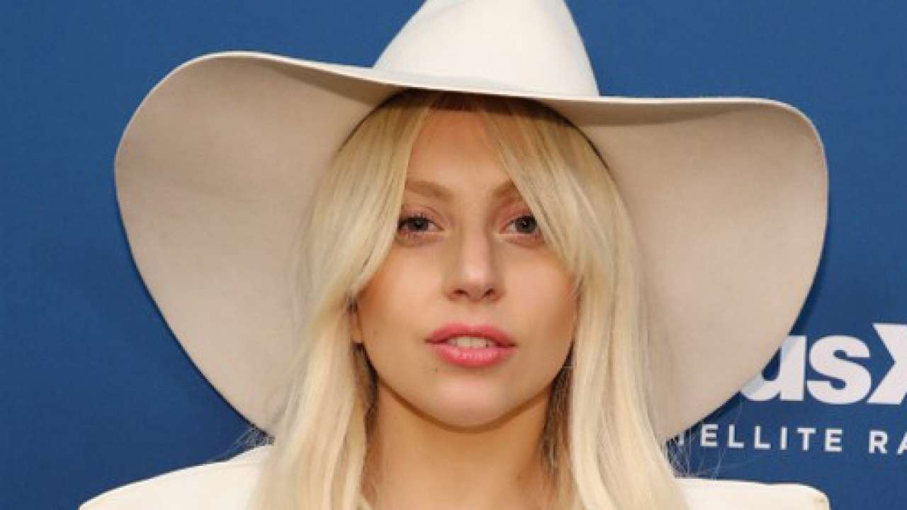 Lady Gaga Goes Topless For Versace Ad 9399