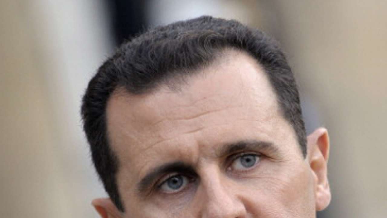 President Bashar al-Assad's forces advance into rebel border town