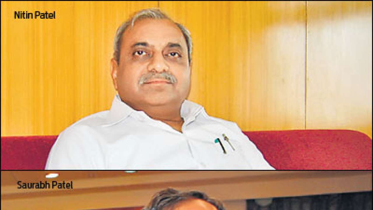 CM retains home & industry; Saurabh Patel gets finance