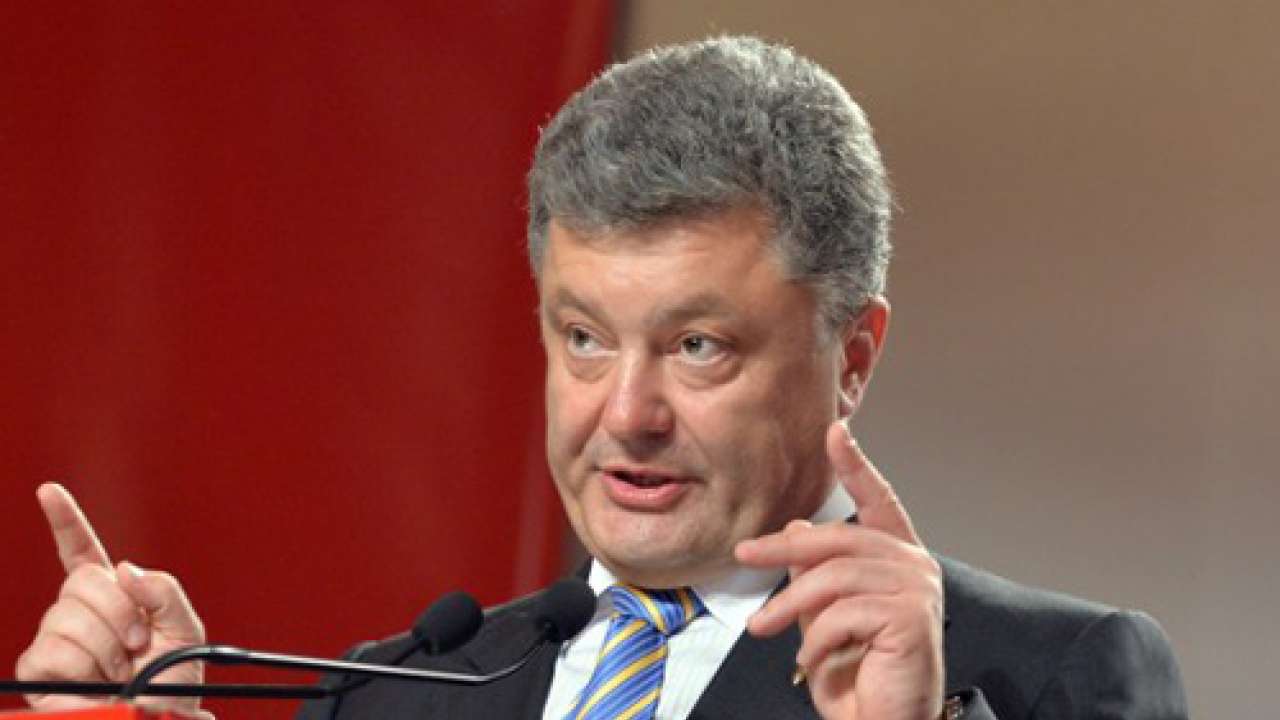 Ukraine's Petro Poroshenko says pro-Russian separatists must lay down arms