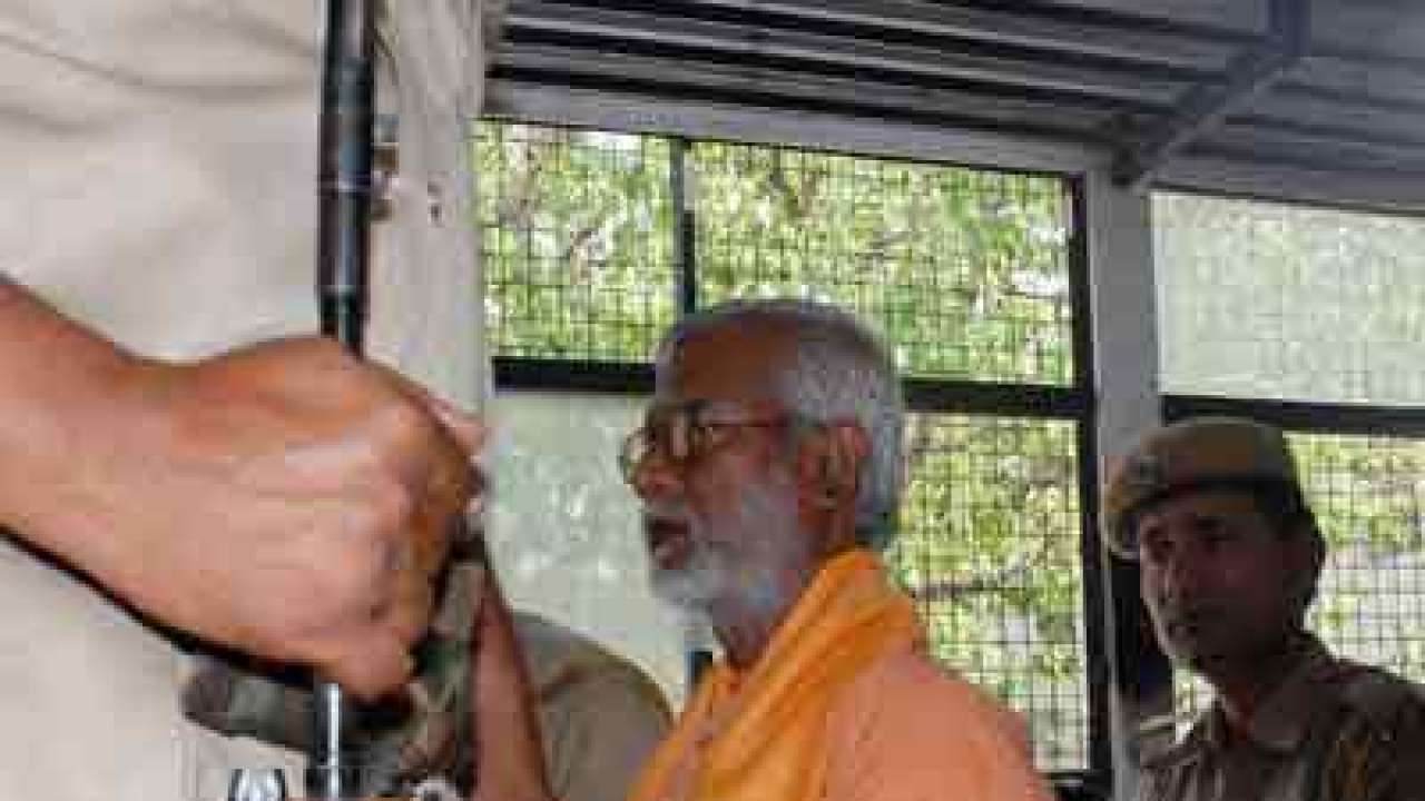 Who is Swami Aseemanand?