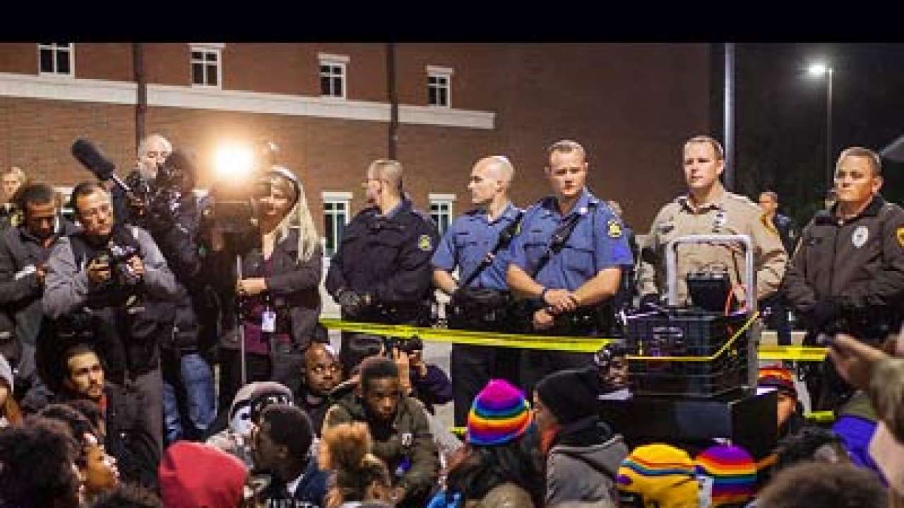 Marchers confront riot police over Missouri shootings, more protests ...