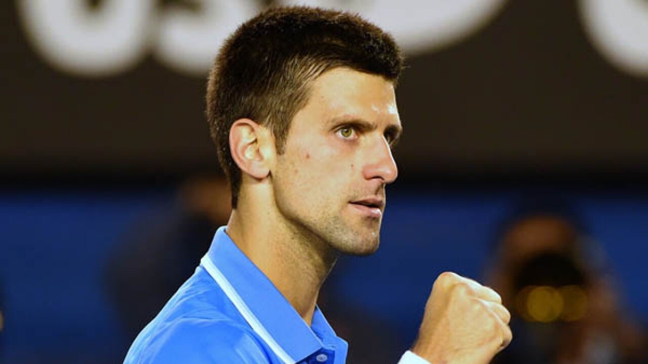 Novak Djokovic slides smoothly through in Monte Carlo